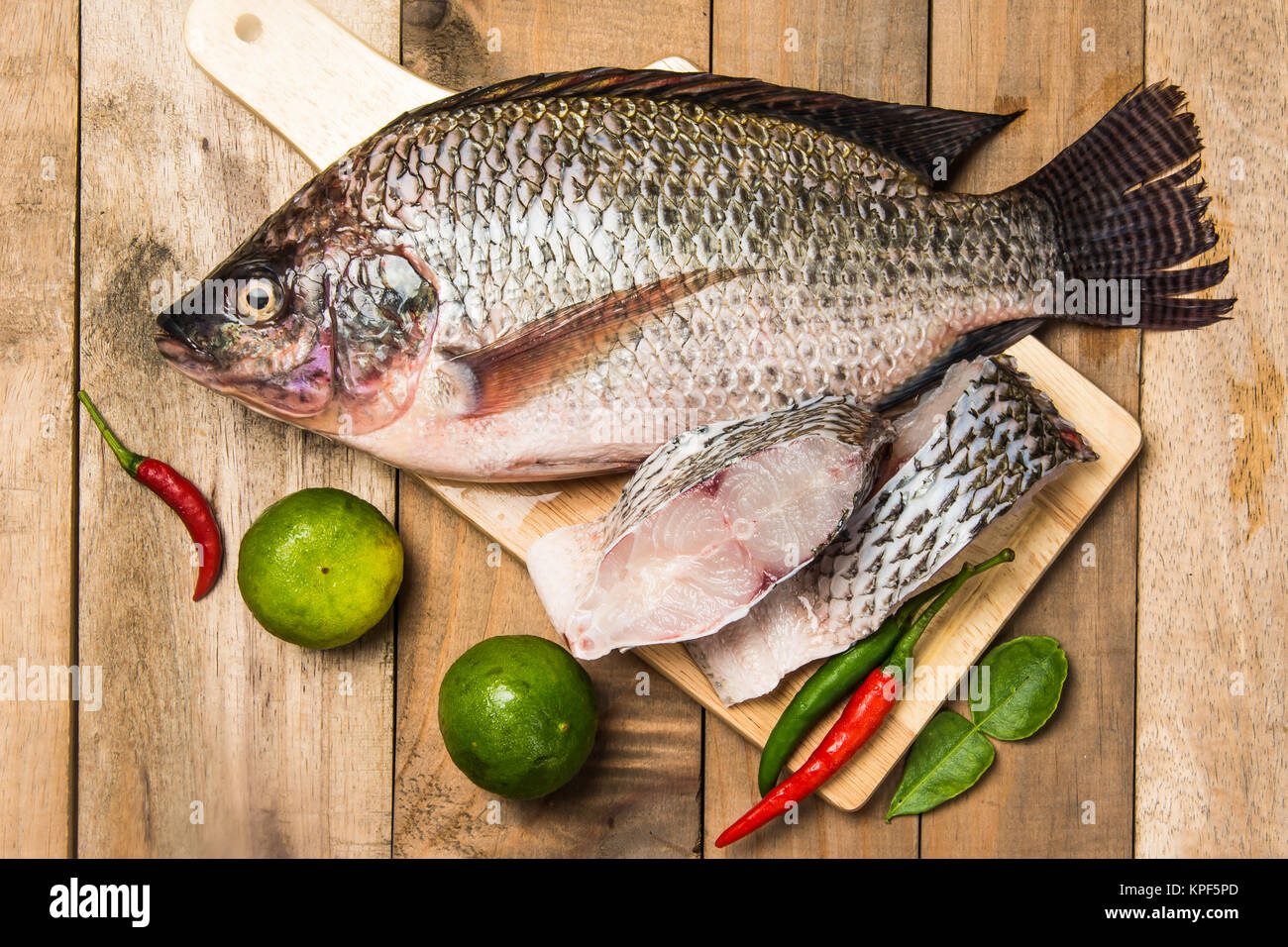 Fresh raw fish on the wood Stock Photo - Alamy