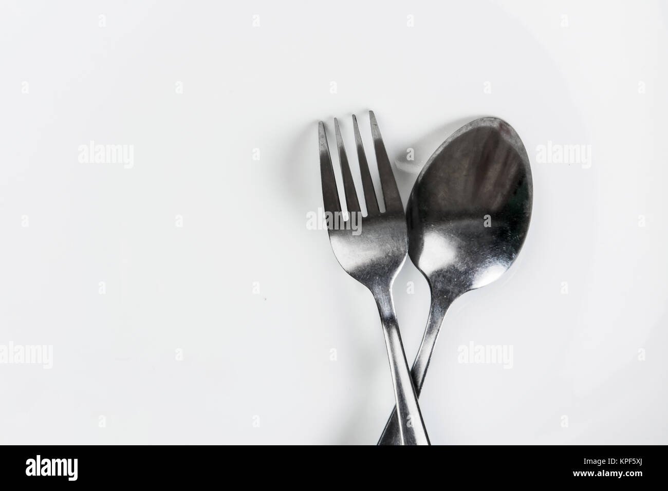 Spoon and fork Stock Photo - Alamy