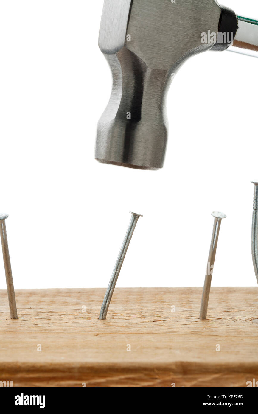 hammering nails on wood Stock Photo - Alamy