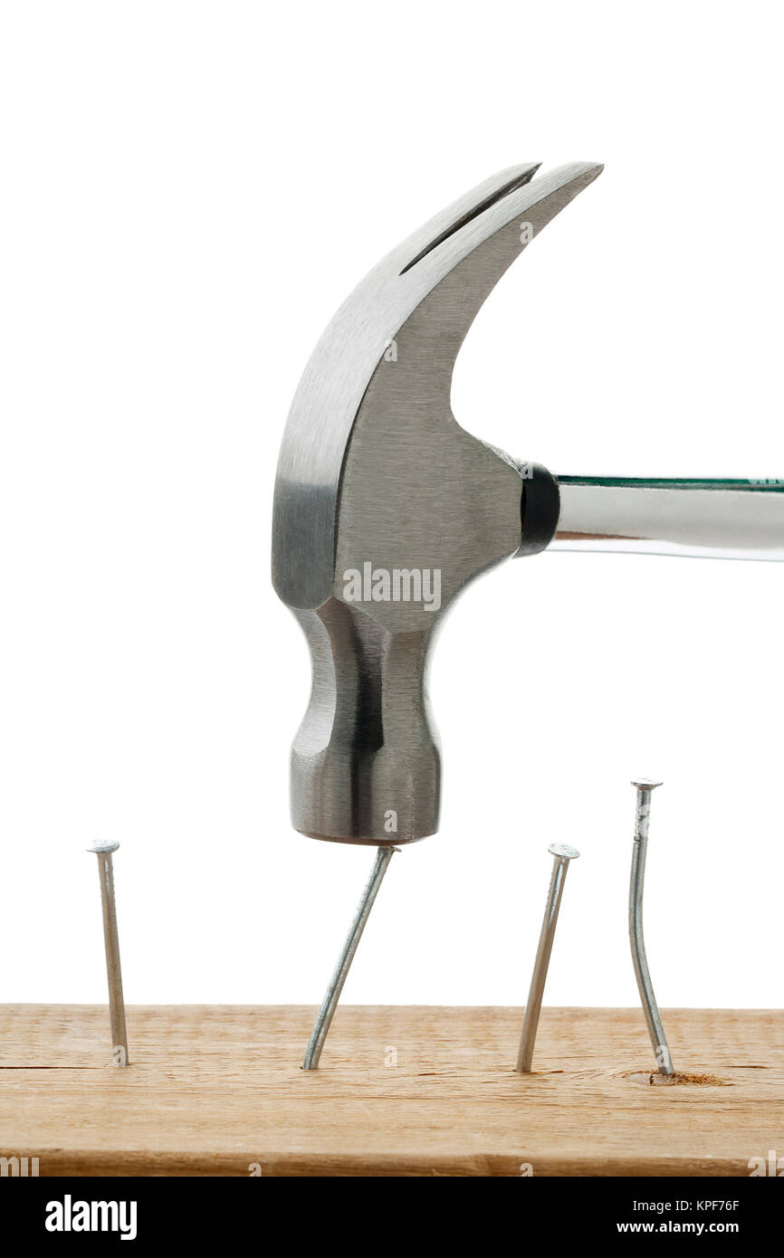 hammering nails on wooden plank Stock Photo - Alamy