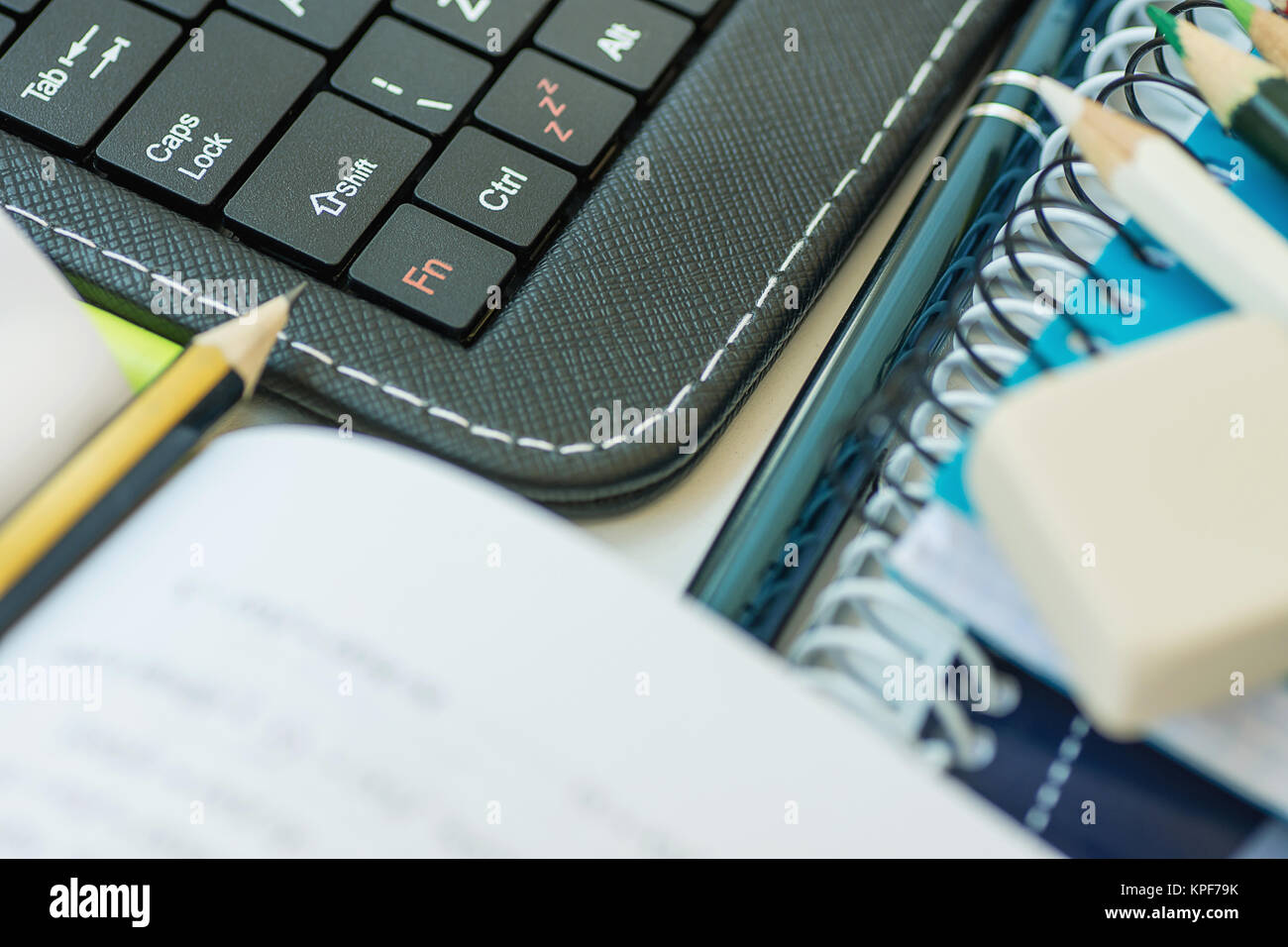 Laptop Tablet Keyboard Opened Textbook Pencil Stack of Notebooks Pen on ...