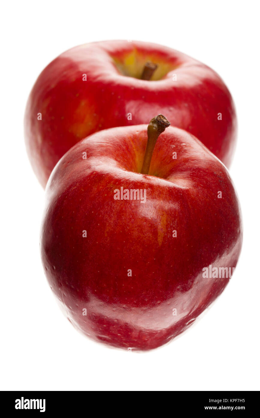 Two red apples Cut Out Stock Images & Pictures - Alamy