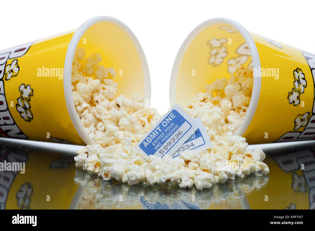 two tickets and spilled popcorn Stock Photo - Alamy