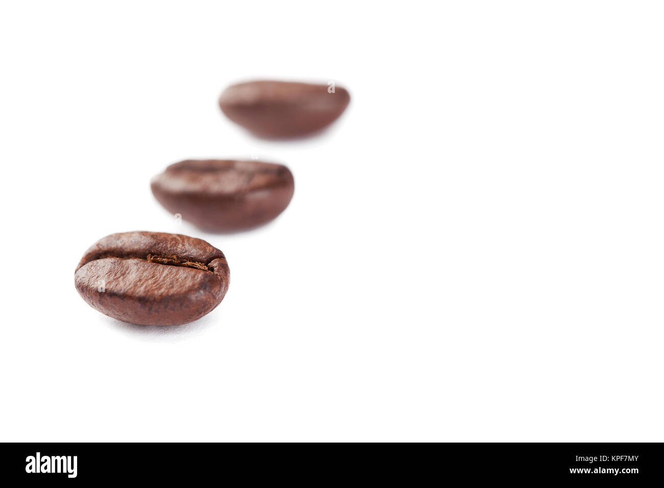 three coffee beans Stock Photo - Alamy
