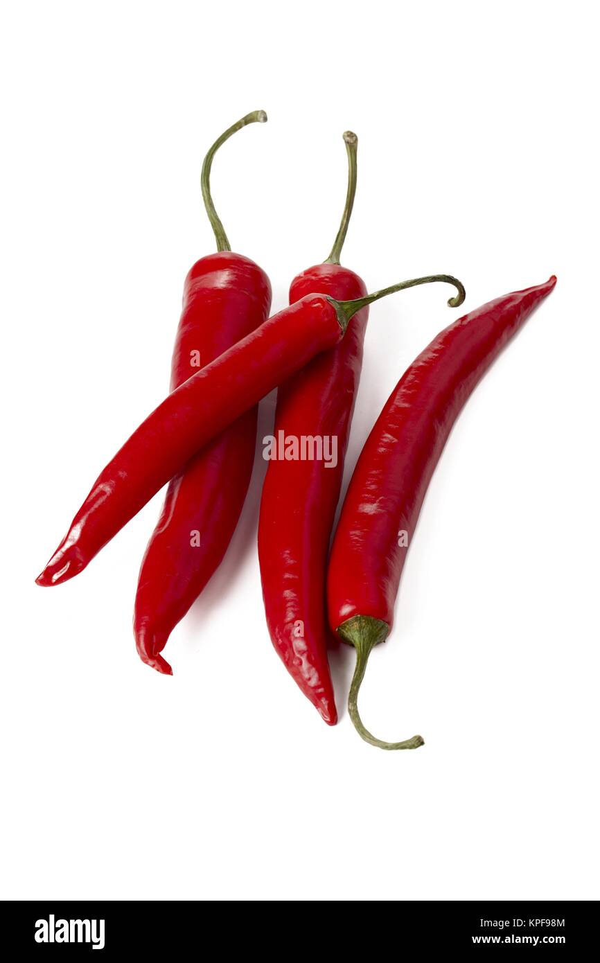 four red chili peppers Stock Photo - Alamy