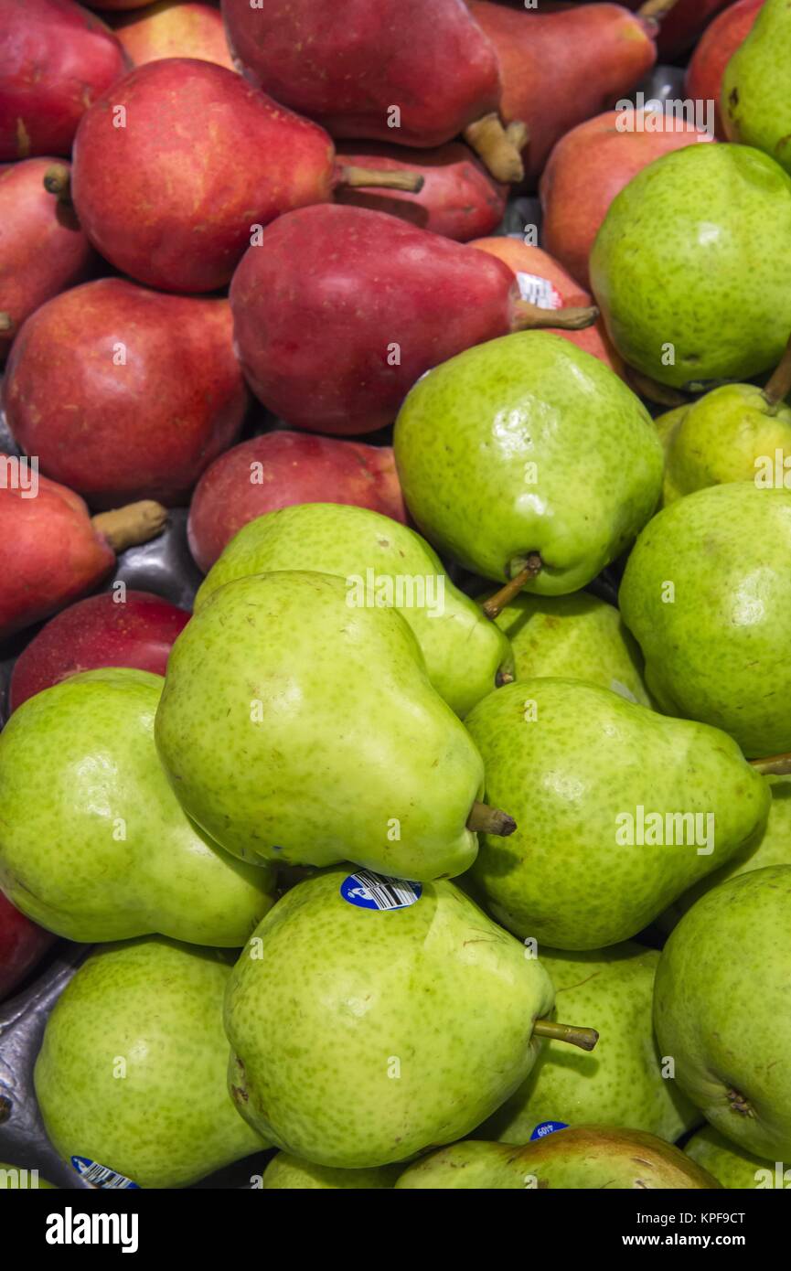 fresh red and green pears from market shelves real with flaws an Stock ...