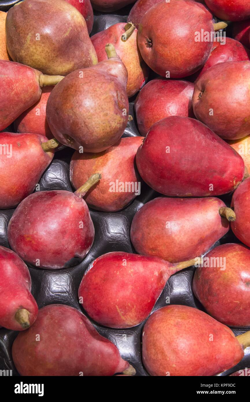 fresh red pears from market shelves real with flaws and bruises Stock ...