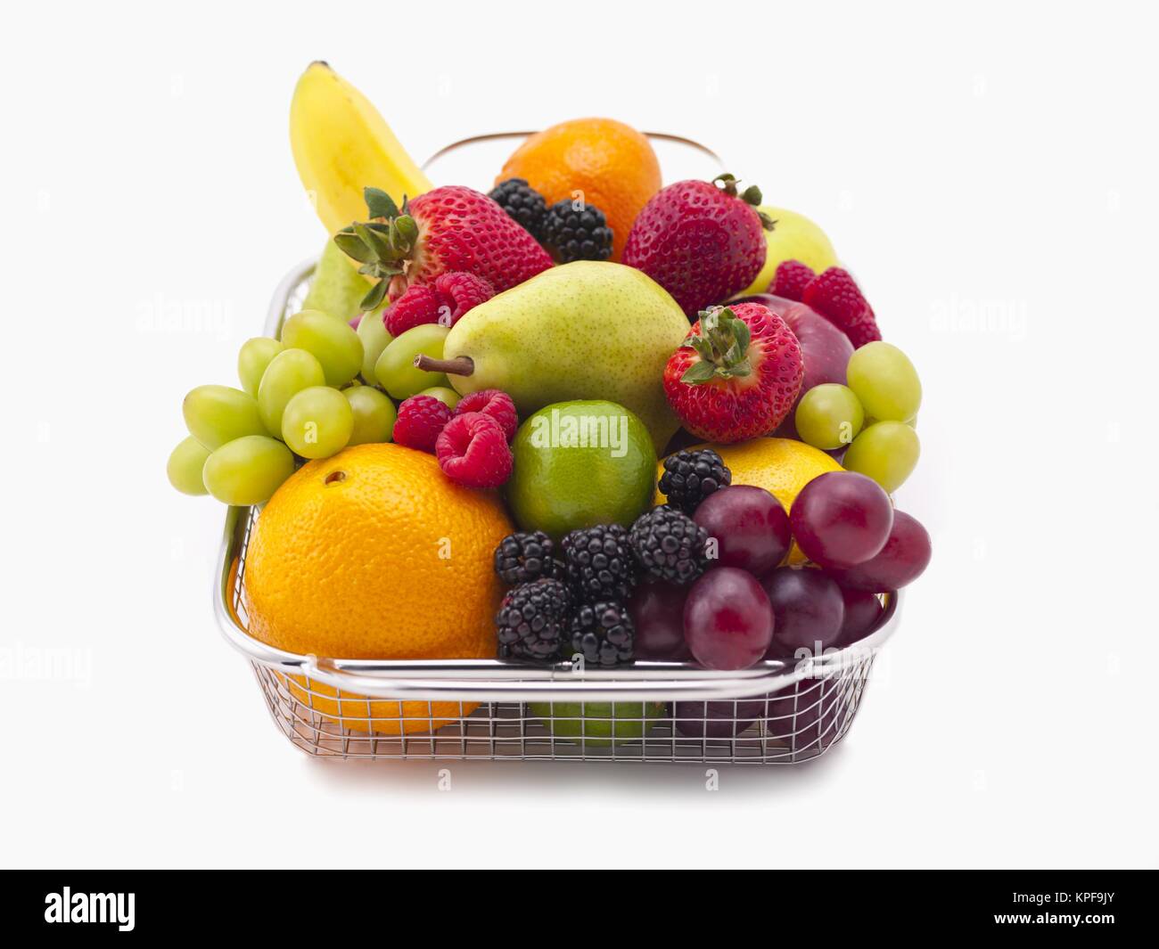 full basket of fruit Stock Photo - Alamy