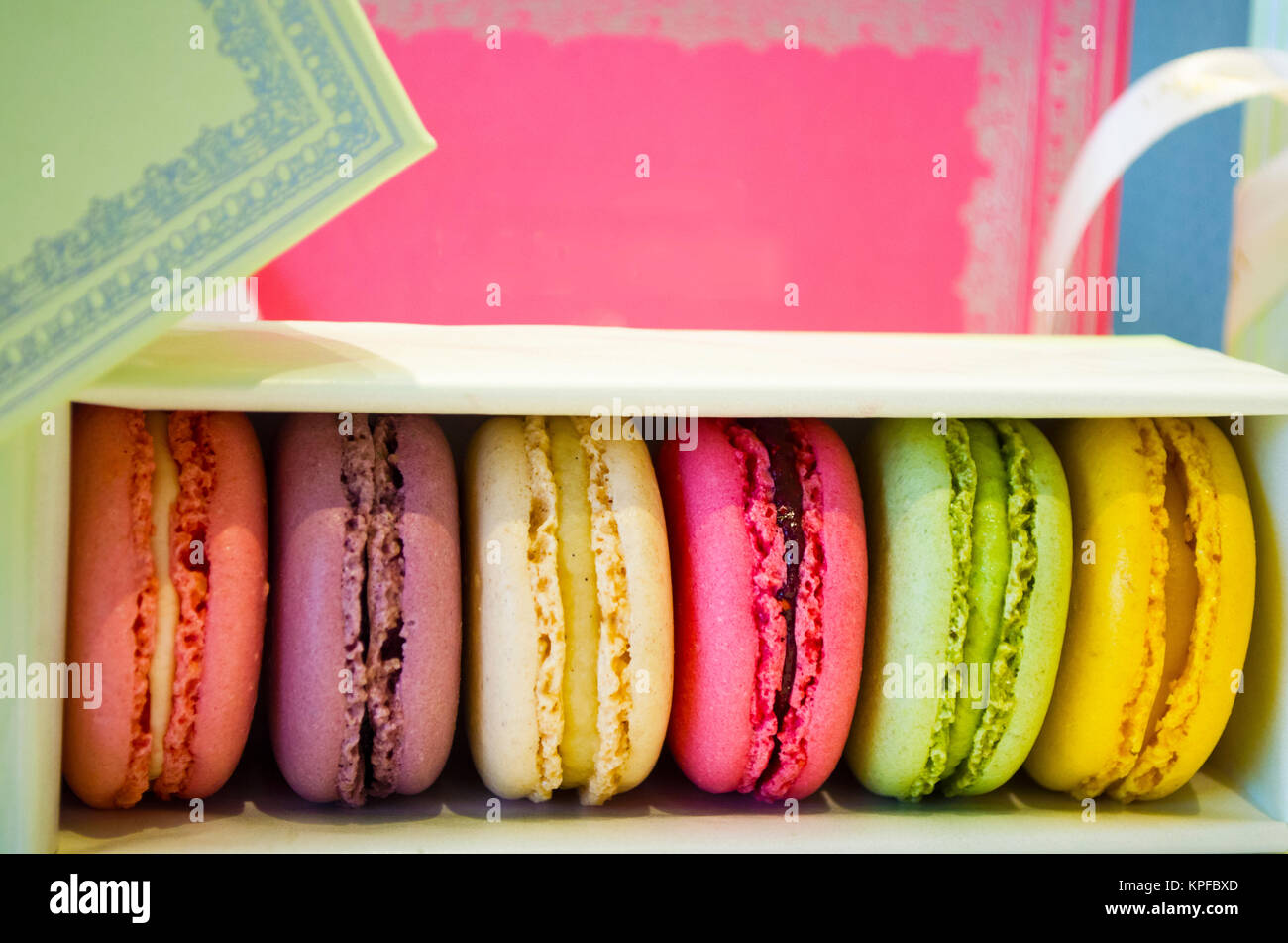 set of different french cookies macaroons in a paper box top view Stock ...