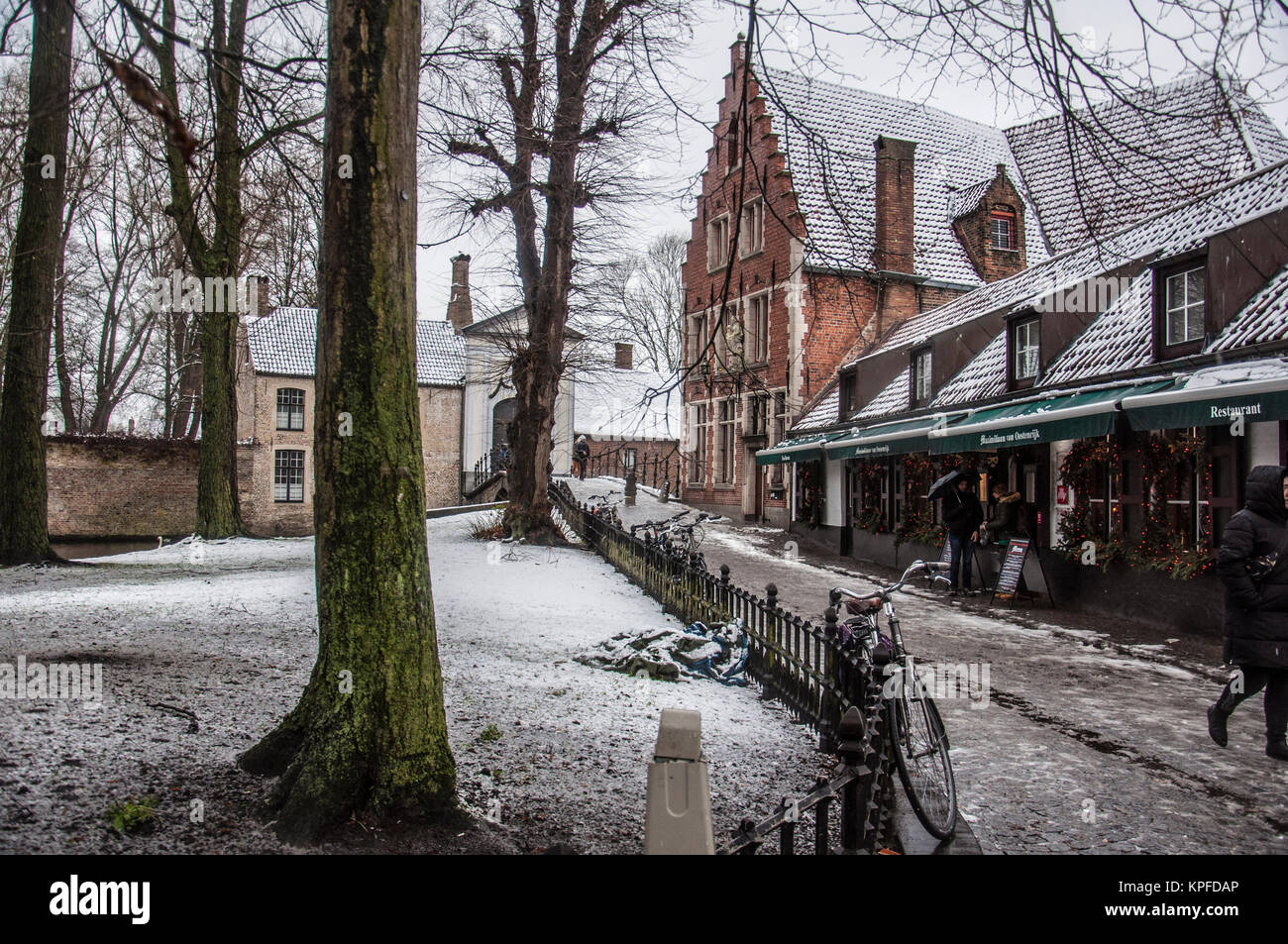 street of bruges, snowing day, snow, brugge, flanders, belgium Stock ...
