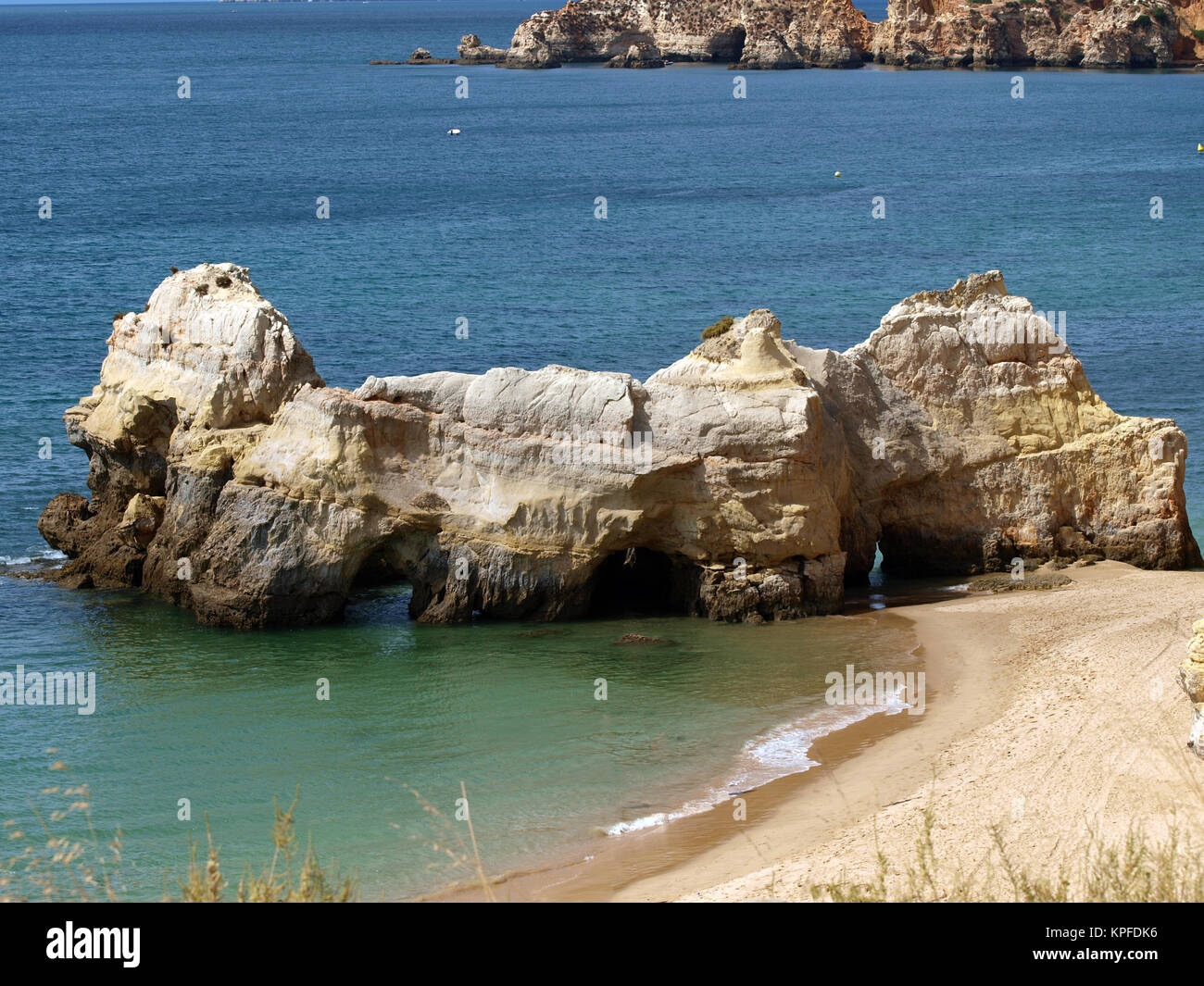 A section of the idyllic Praia de Rocha beach on the Algarve region ...