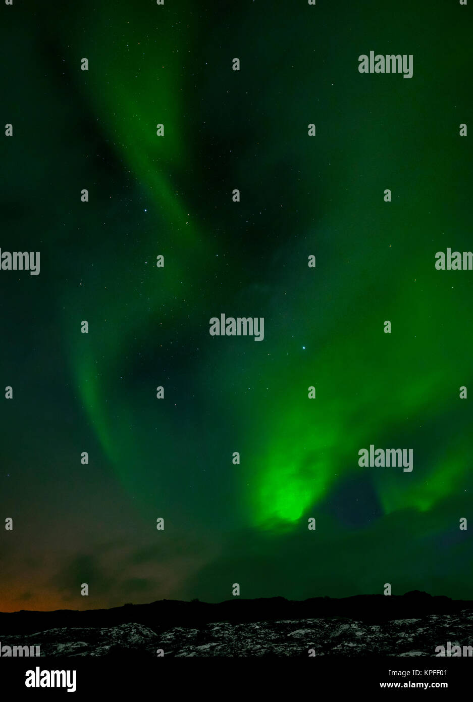 Northern Lights: the Aurora Borealis contrasts with volcanic rocks and ...