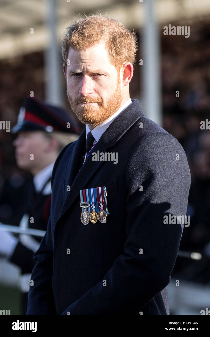 Prince Harry insects the graduating officer cadets at the Royal ...