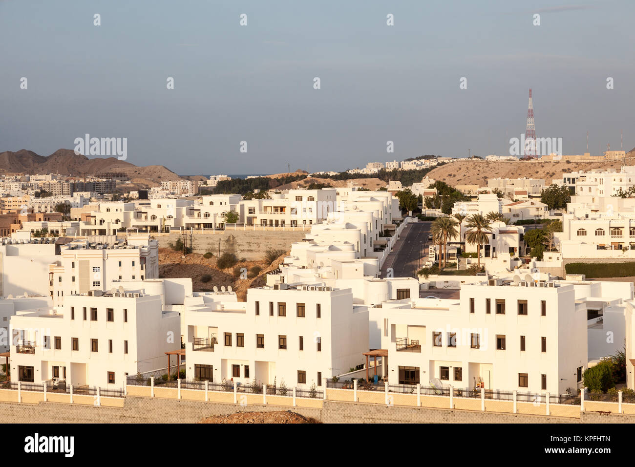 Suburb with modern residential houses in Muscat, Sultanate of Oman ...