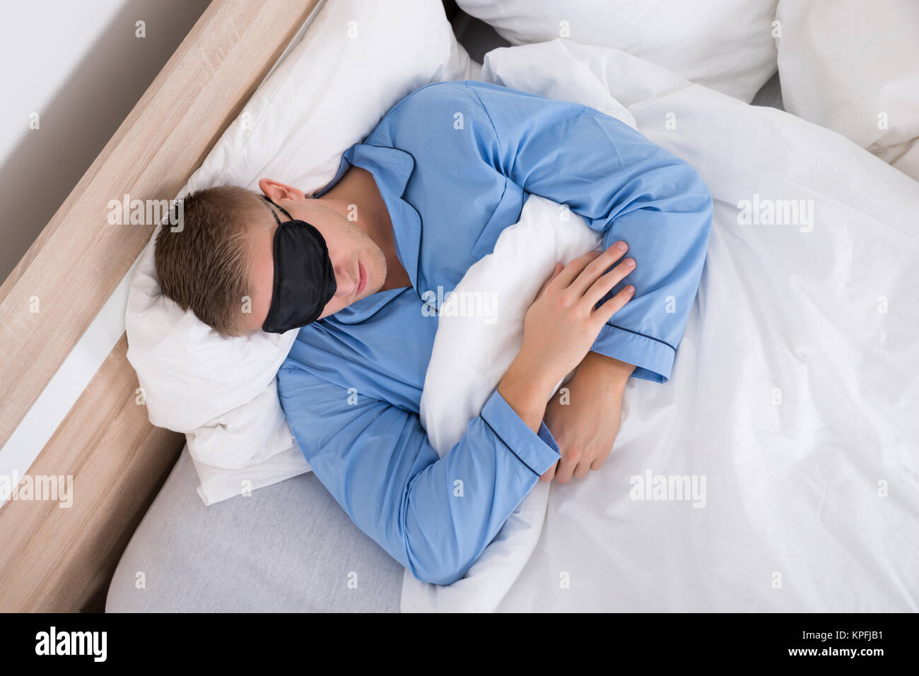Man Sleeping On Bed Stock Photo - Alamy