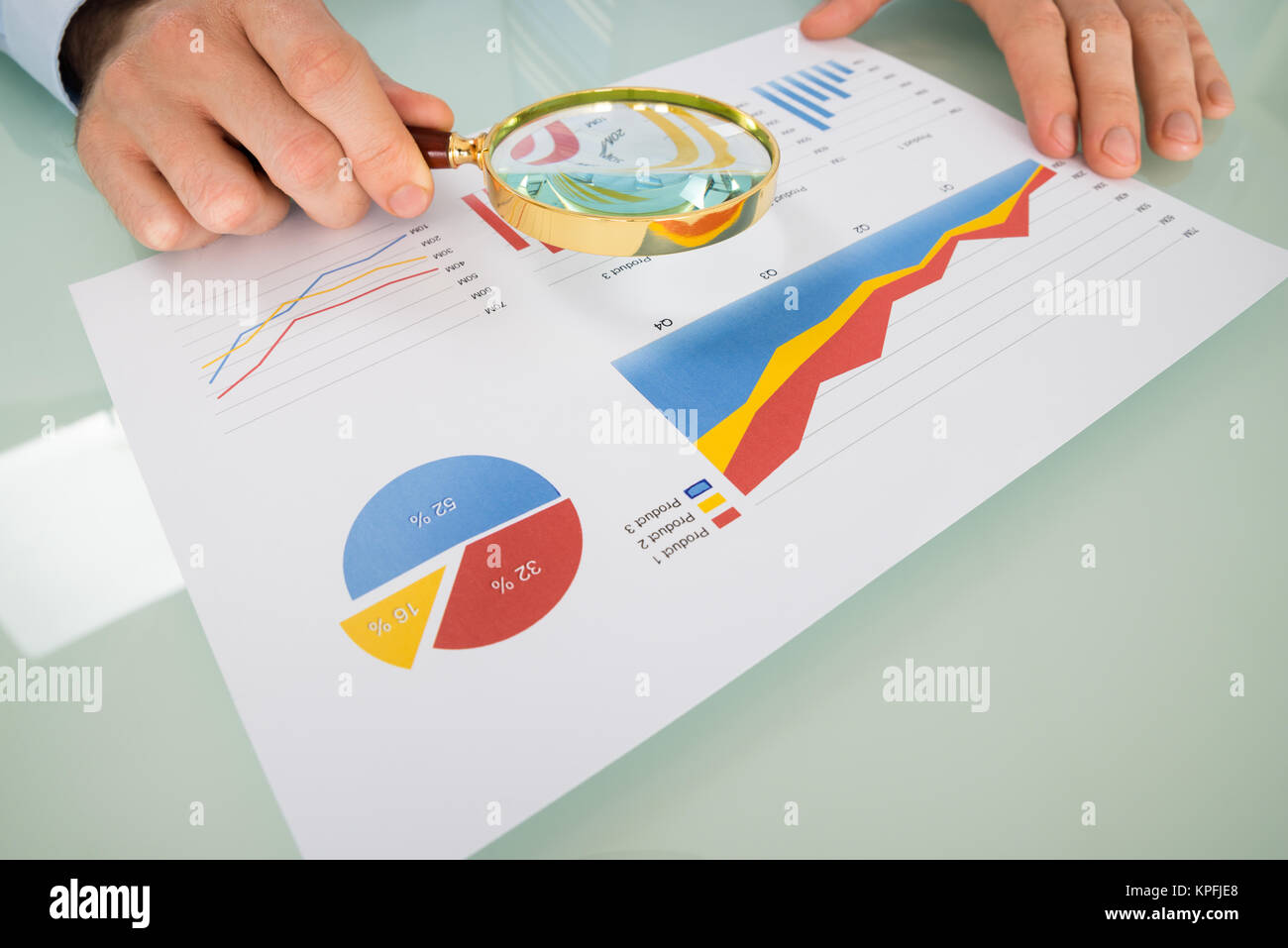 Businessman Analyzing Graph In Office Stock Photo - Alamy
