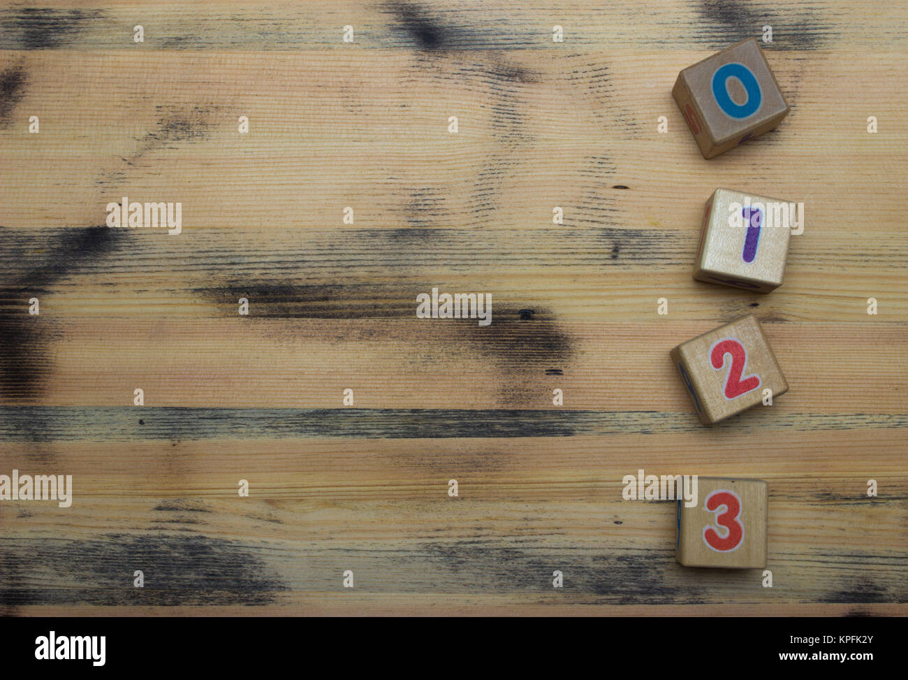Cubes with numbers on wooden background Stock Photo - Alamy