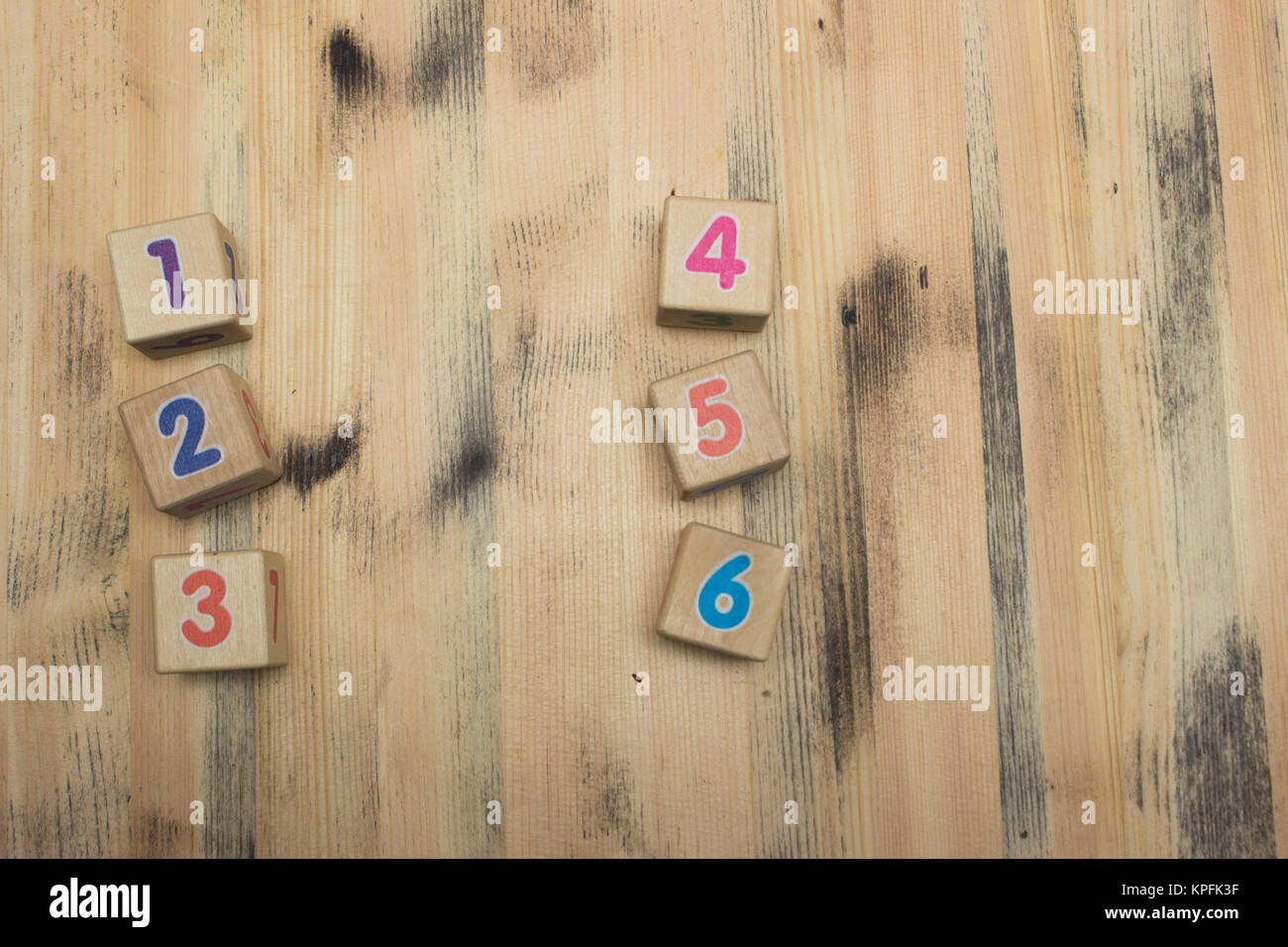 Cubes with numbers on wooden background Stock Photo - Alamy