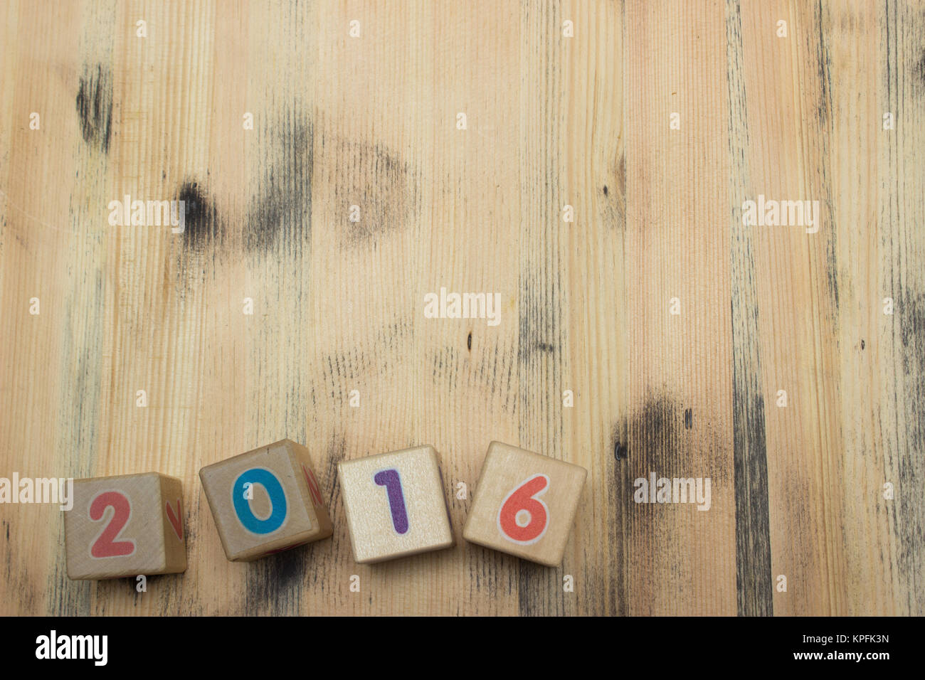 Cubes with numbers on wooden background Stock Photo - Alamy