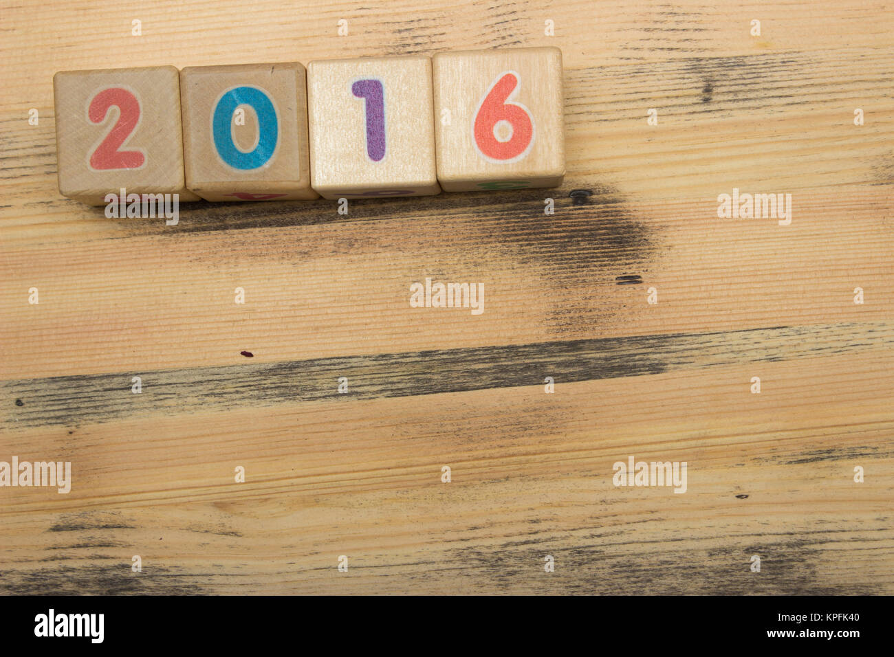 Cubes with numbers on wooden background Stock Photo - Alamy