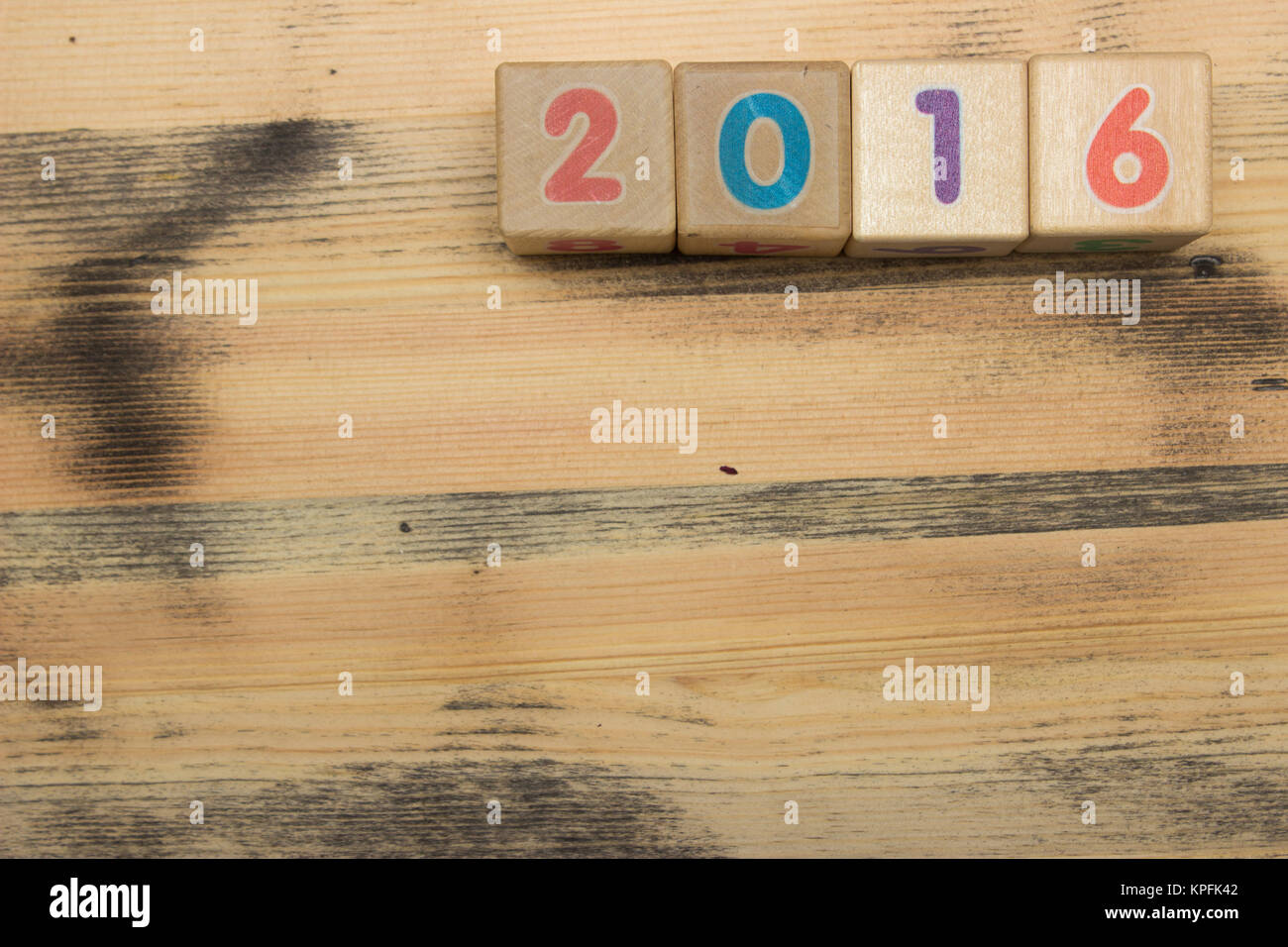 Cubes with numbers on wooden background Stock Photo - Alamy