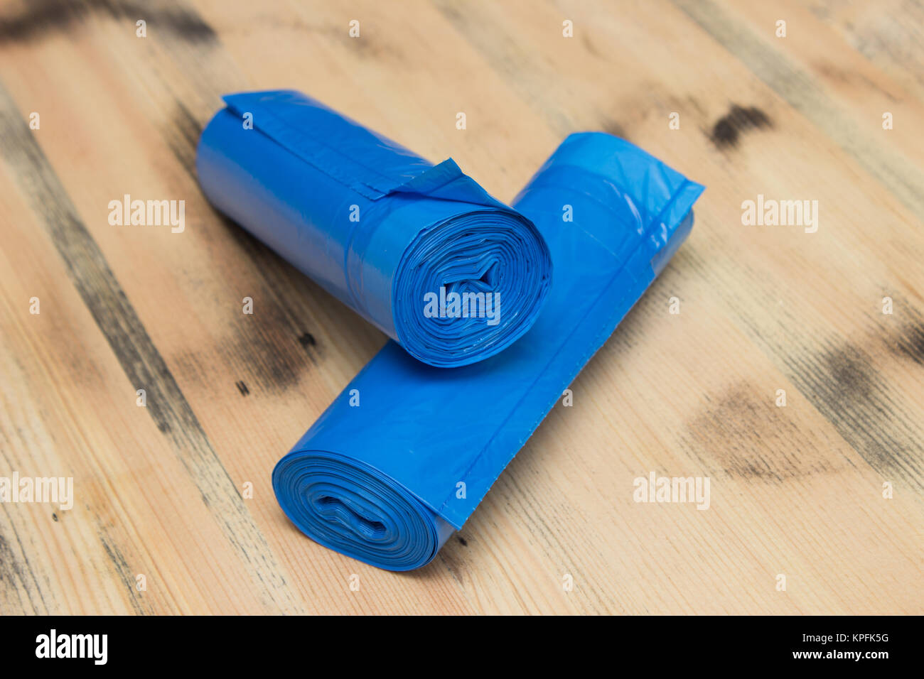 Roll of blue plastic garbage bags Stock Photo - Alamy