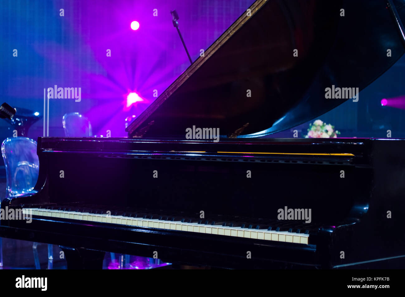 Lights beams on stage with piano and musical instruments Stock Photo ...