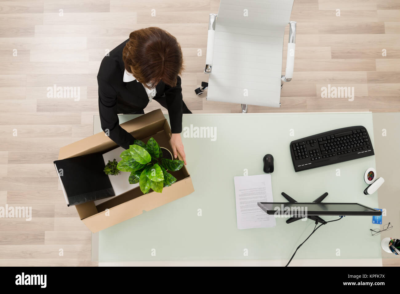 Sad Woman Packing Boxes High Resolution Stock Photography and Images ...