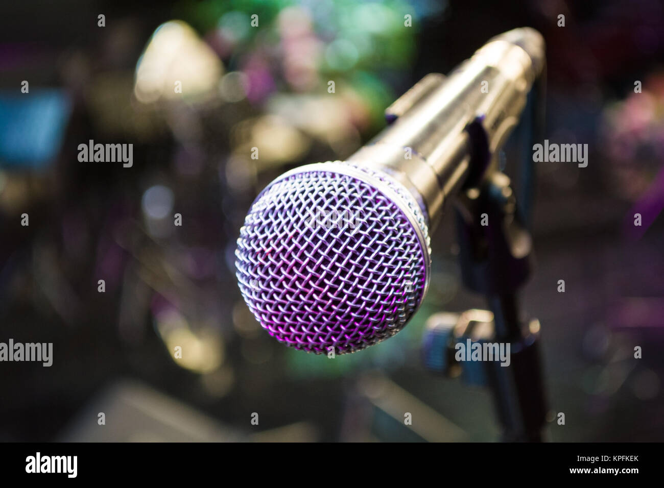 microphone on stage against a background of auditorium Stock Photo - Alamy