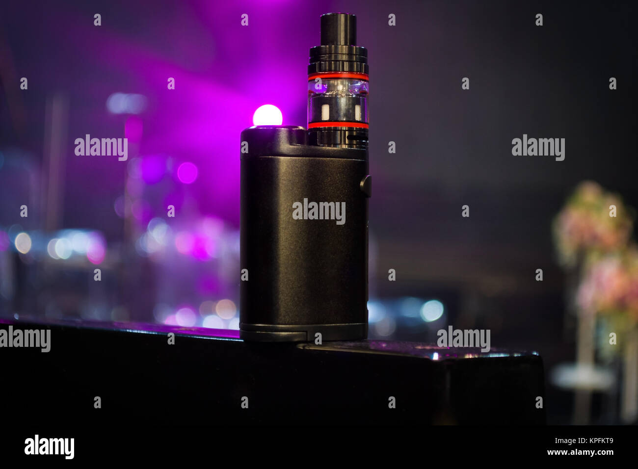 electronic cigarette over colorful background Stock Photo - Alamy