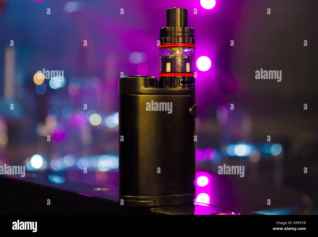electronic cigarette over colorful background Stock Photo - Alamy