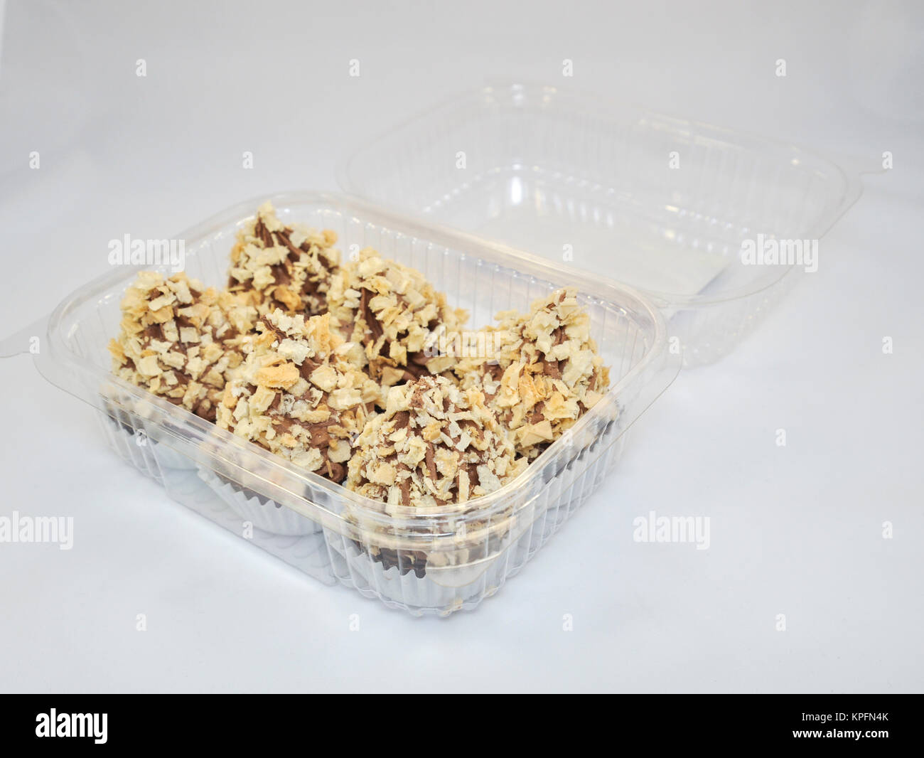 Group cakes in the package Stock Photo - Alamy
