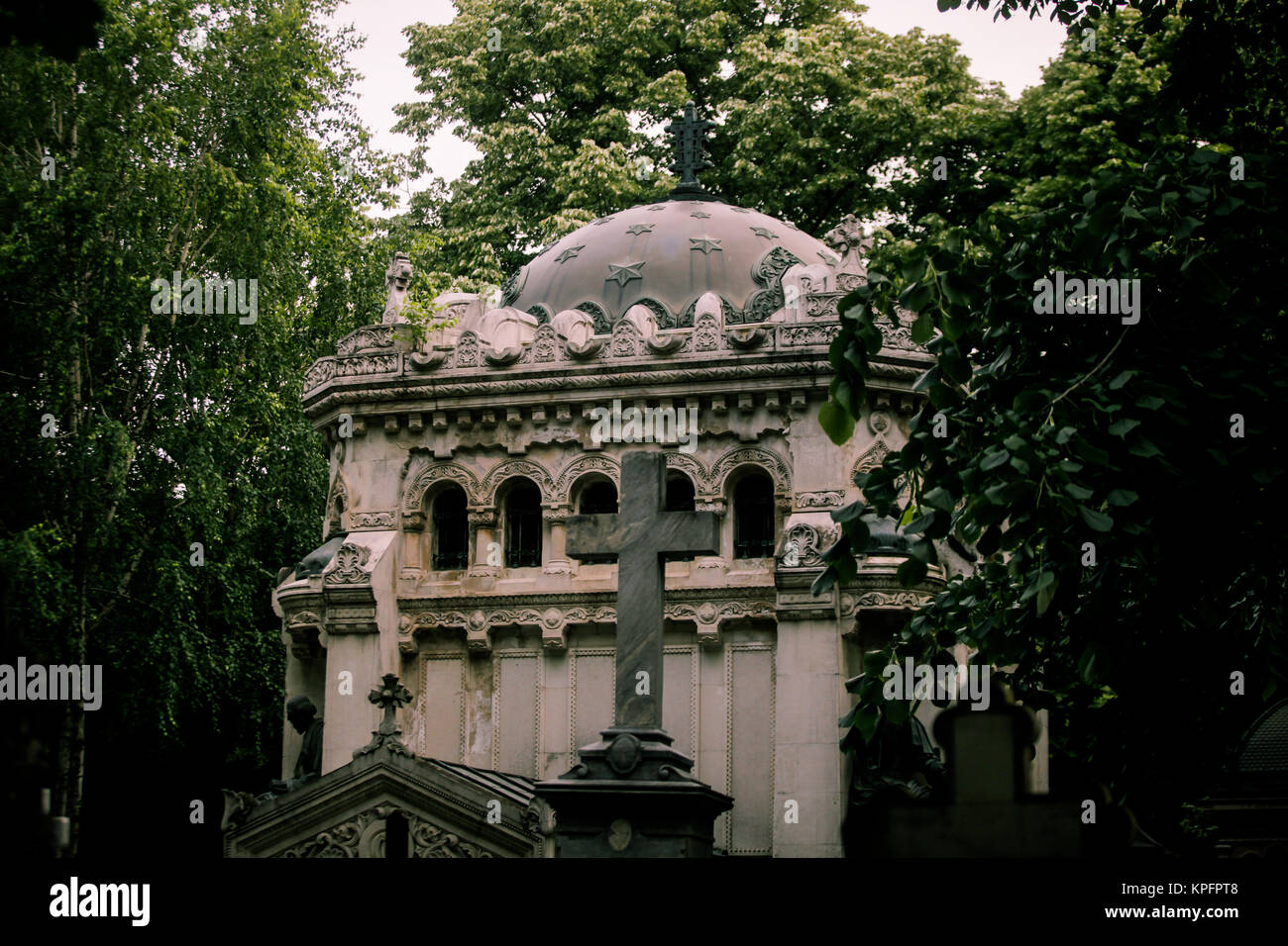 Graves, statues and crypts in an old cemetery Stock Photo - Alamy