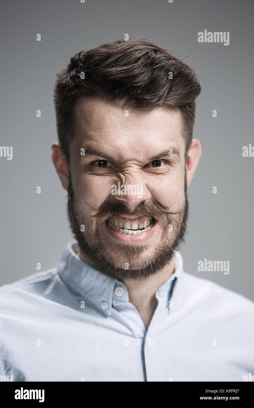 Close up face of angry man Stock Photo - Alamy
