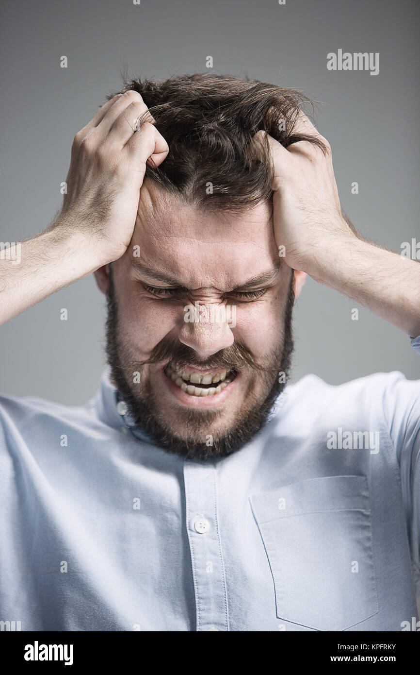 Close up face of desperate man Stock Photo - Alamy