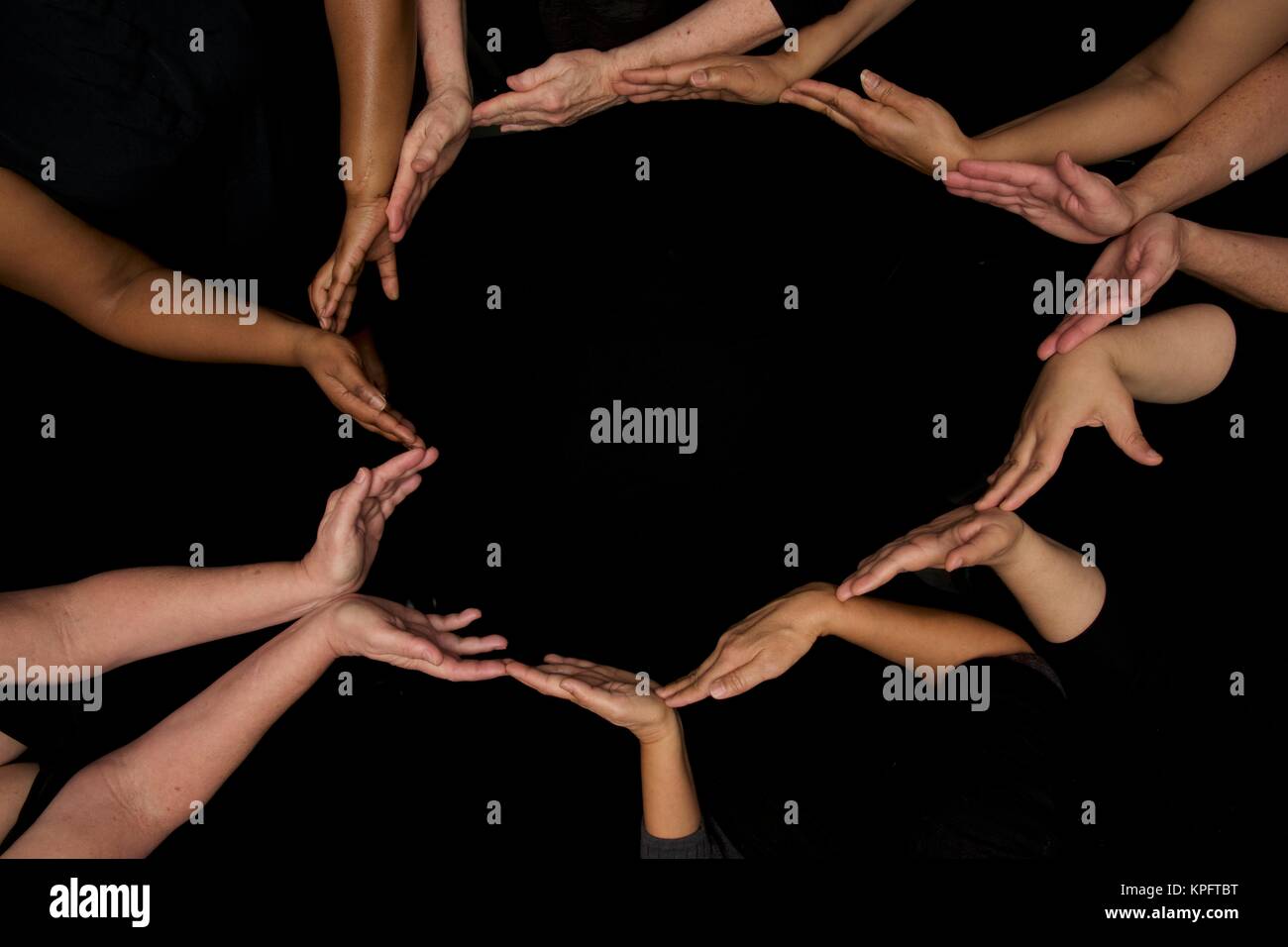 hands of many colors unite in harmonious diversity and heart felt team ...