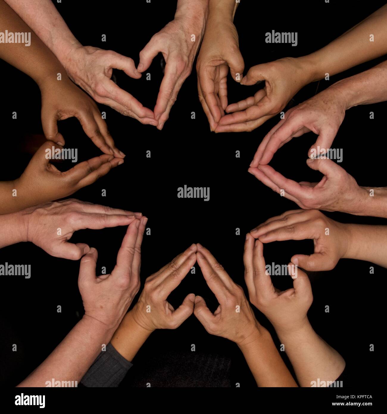 hands of many colors unite in harmonious diversity and heart felt team ...