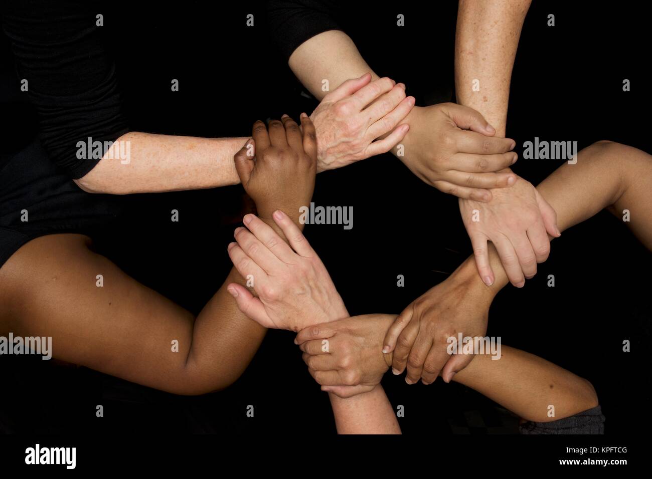 hands of many colors unite in harmonious diversity and heart felt team ...