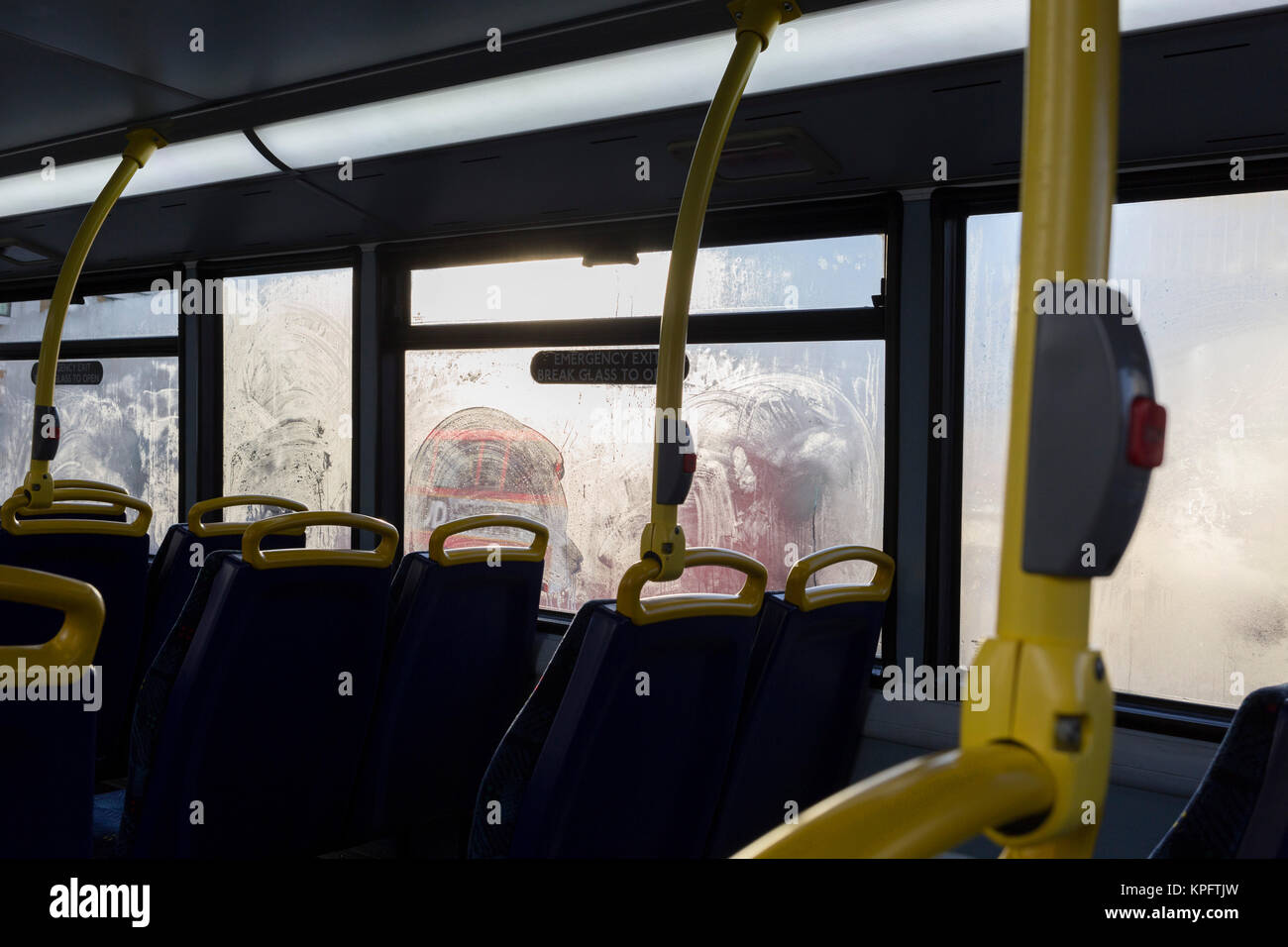 Steam-up windows on the top deck of a double-decker bus in central ...