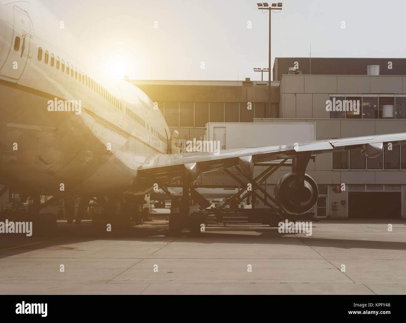 Plane at the airport terminal. Boarding started Stock Photo - Alamy