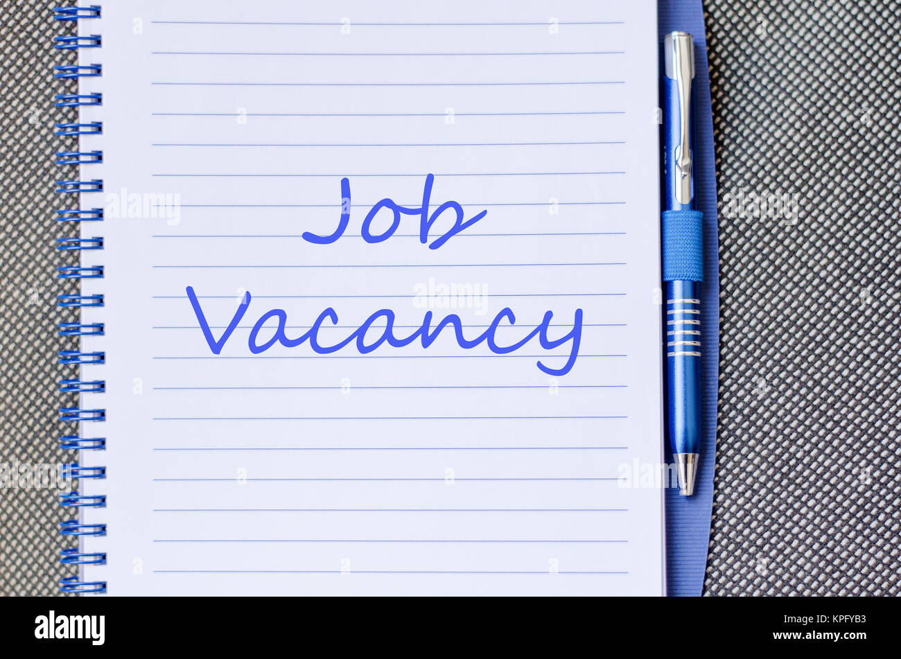 Job vacancy write on notebook Stock Photo - Alamy
