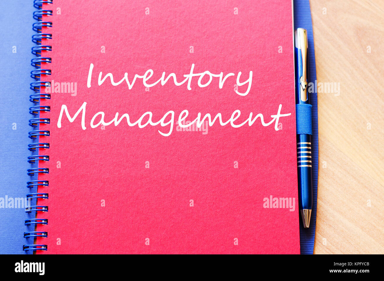 Inventory management write on notebook Stock Photo - Alamy