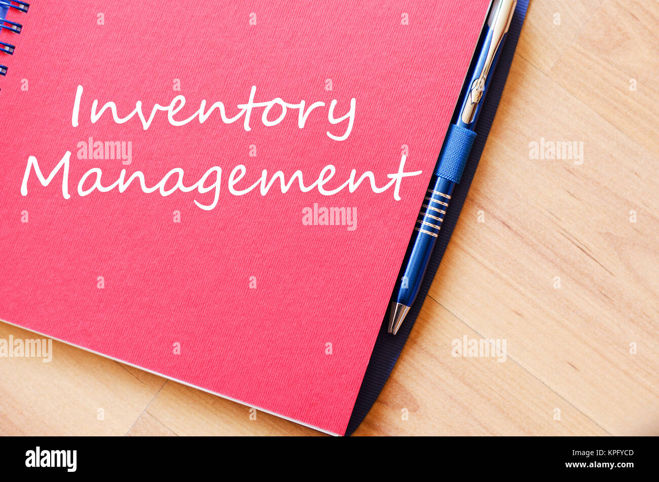 Inventory management write on notebook Stock Photo - Alamy