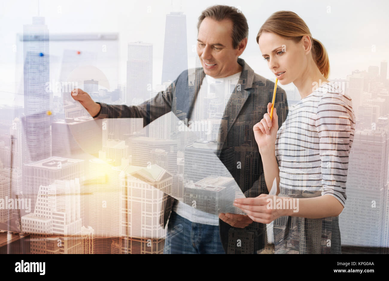 Professional engineers working in the office on teh blueprint Stock ...