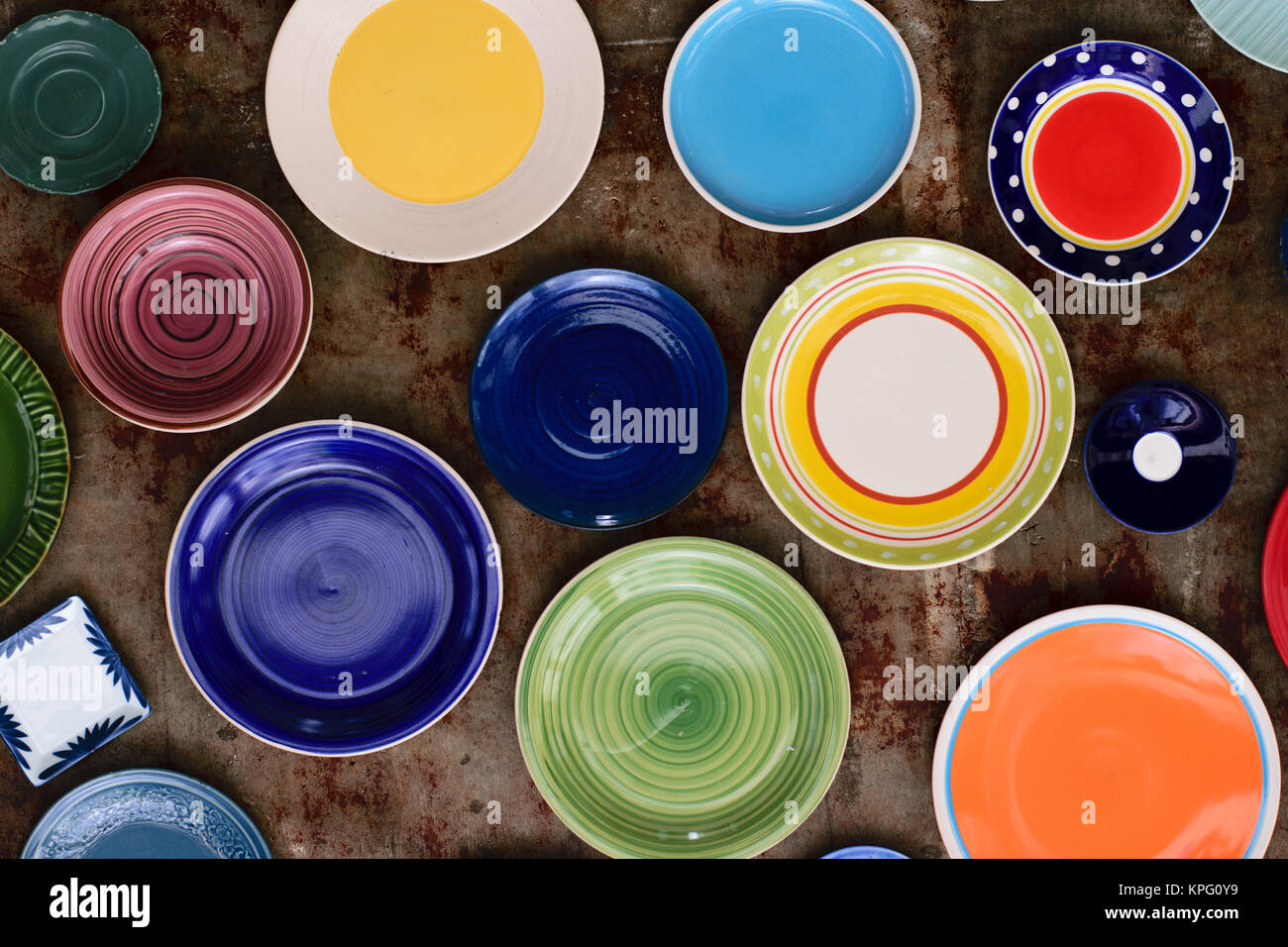 Plates of different colors are red hi-res stock photography and images ...