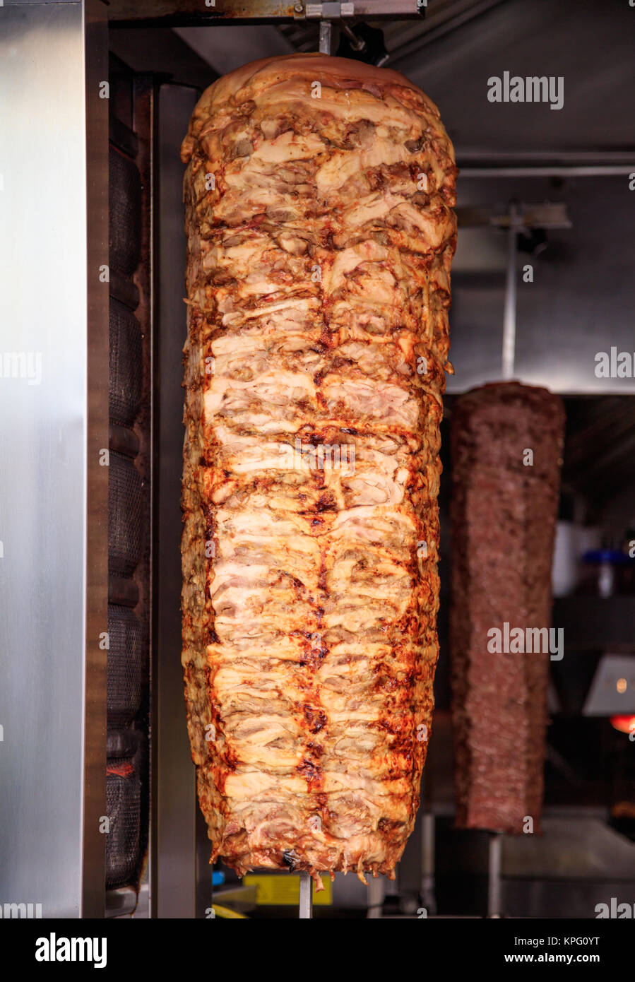Gyros or doner, Middle East traditional food. Slices of meat on a ...