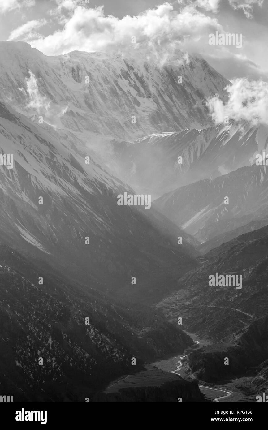 Marsyangdi river flows at the foot of the mountains. Nepal, Himalayas ...
