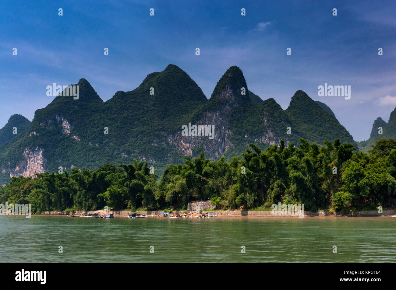 View of the Li River with the tall limestone peaks on the background ...
