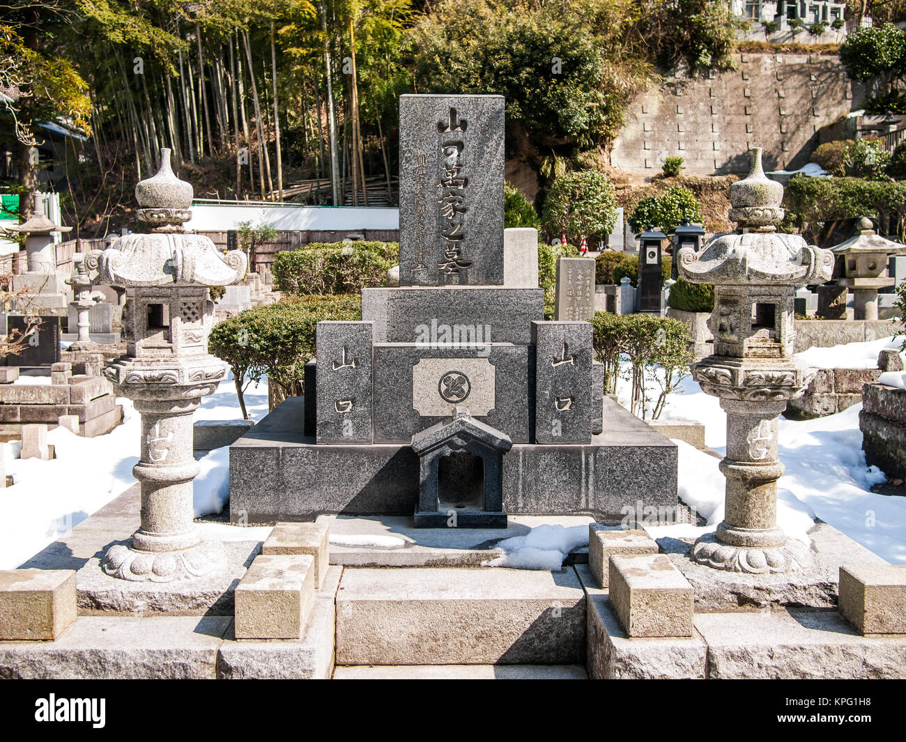 Kamakura, Japan - February 21, 2014 - A typical japanese grave in ...