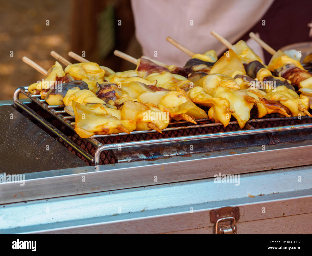 fresh squid barbeque grilled on stove Stock Photo - Alamy